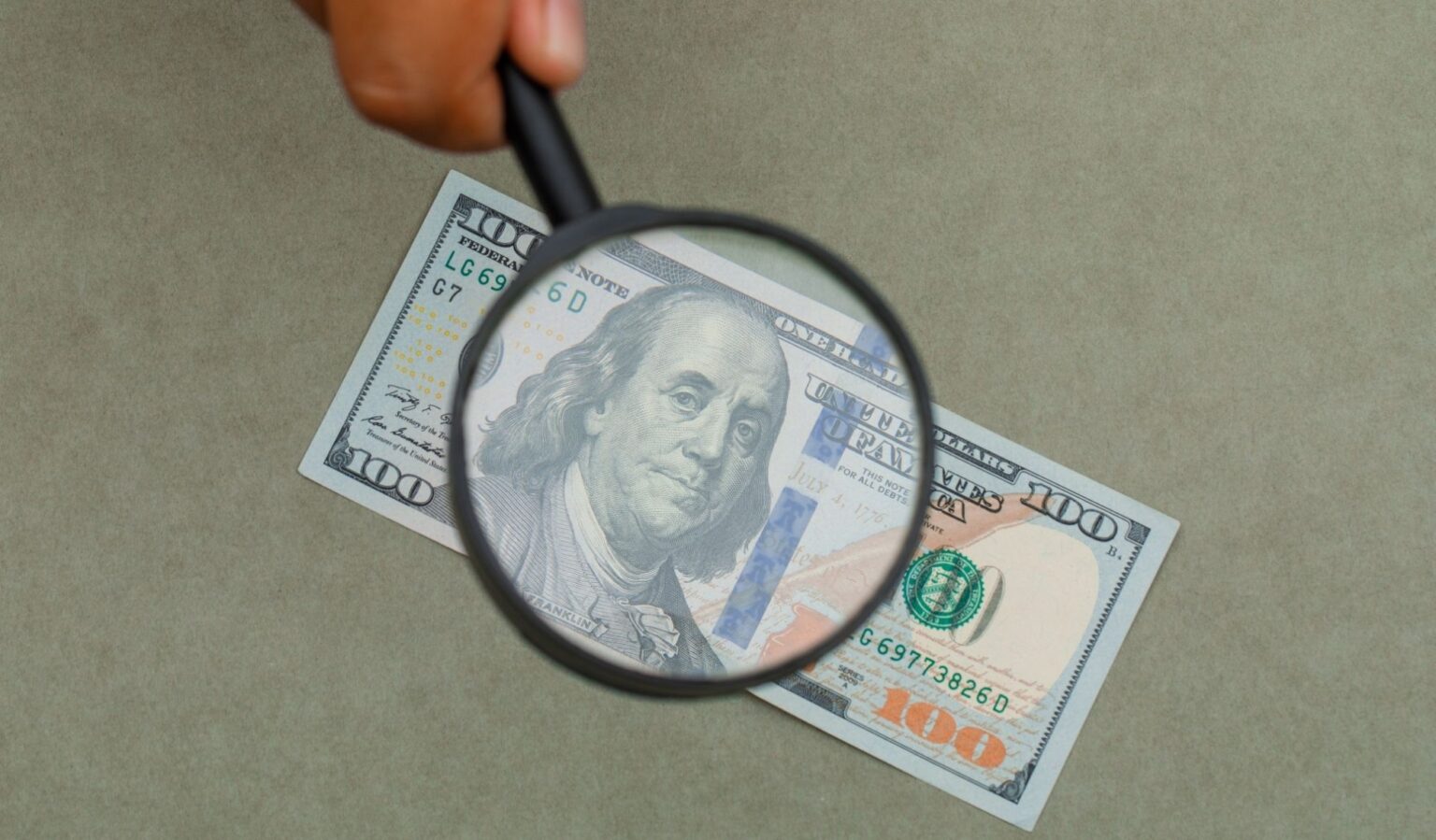 How To Tell If A 100 Dollar Bill Is Real? - Let's Understand